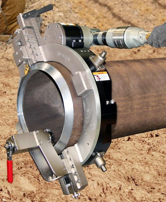 Clamshell split-frame machine bevels and bores simultaneously