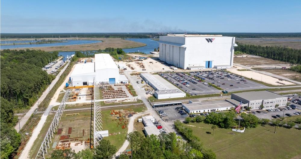 HII to acquire W Intl.