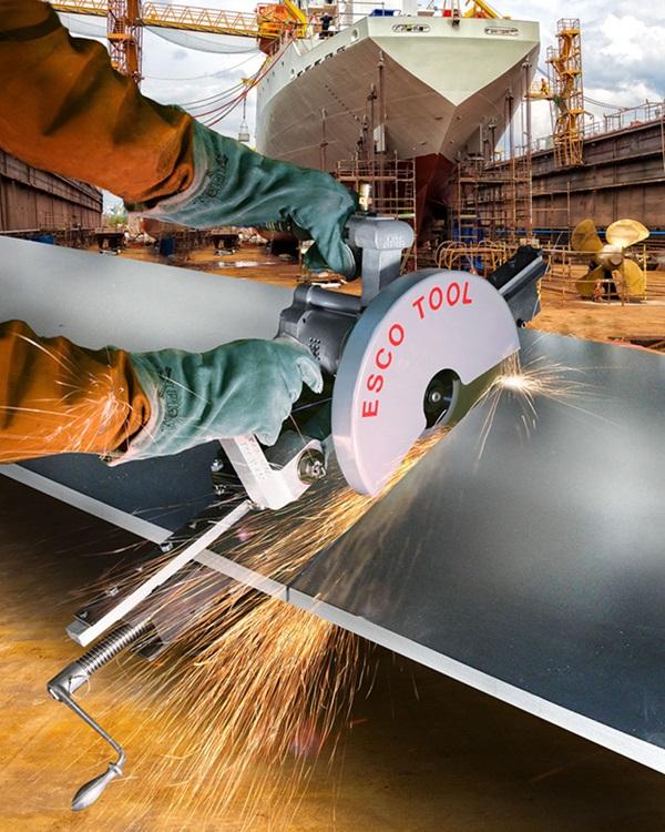 Pneumatic saw and clamp cuts thick steel plate on-site