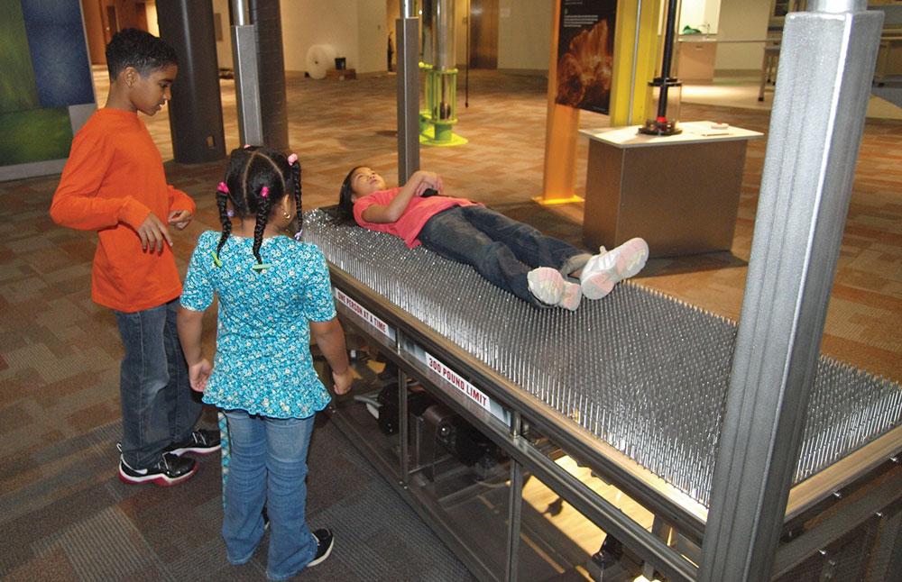 Shop taps into learning by fabricating science center exhibits