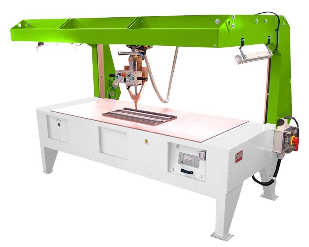 Table-style spot welding system simplifies processing of heavy and ...